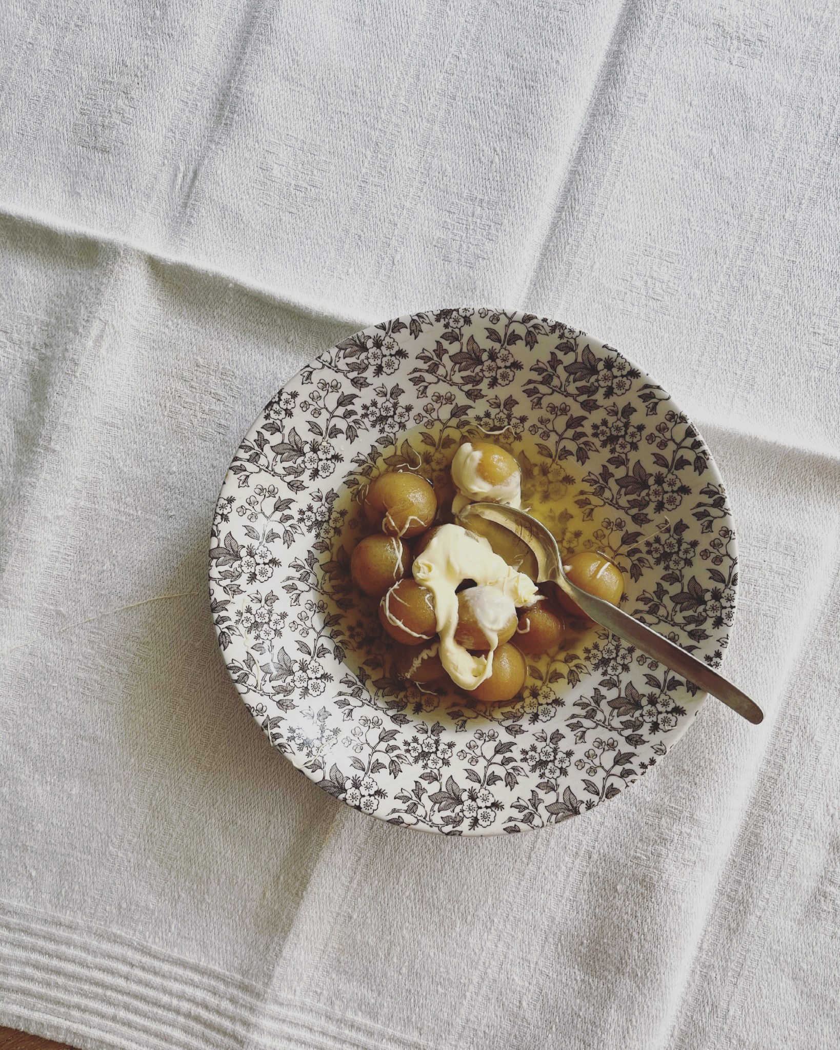 Stewed Pakistani dried apricots with a spoonful of double cream ...